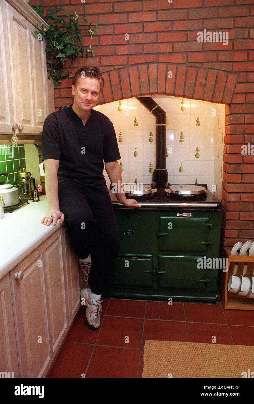 James MacPherson actor in Taggart In his kitchen with old wood stove ...