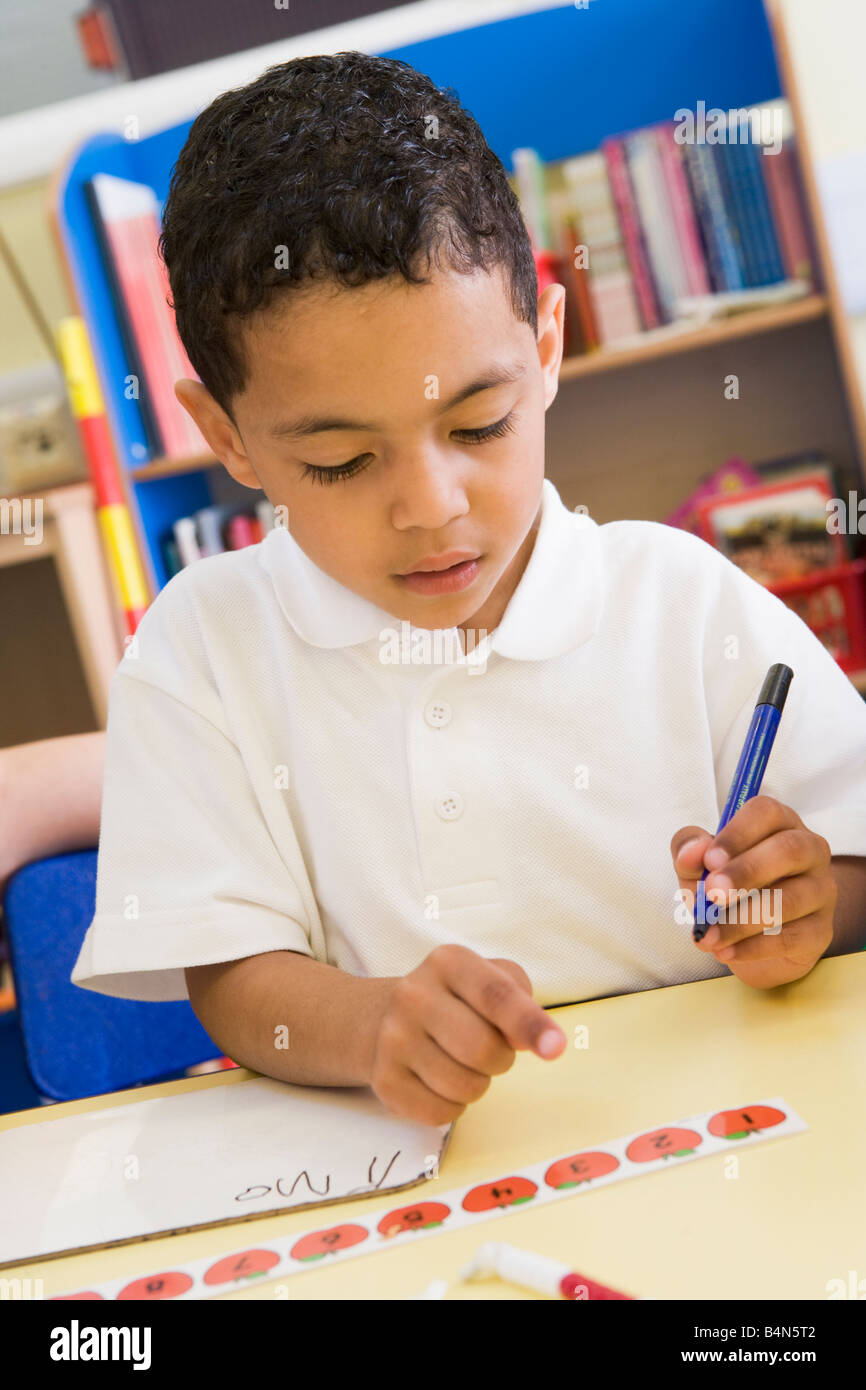 Student in class learning numbers (selective focus Stock Photo - Alamy