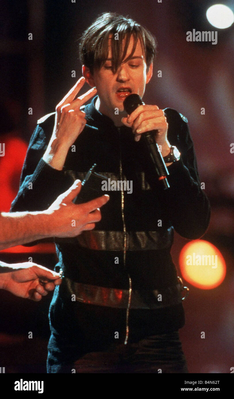 Jarvis Cocker lead singer of Pulp on stage 1996 Stock Photo - Alamy