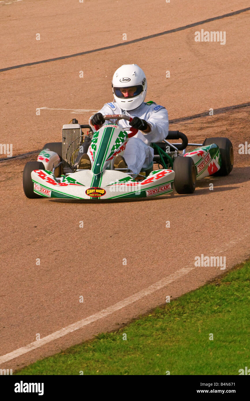 A landscape colour photograph of a single go-kart doing the circuit ...
