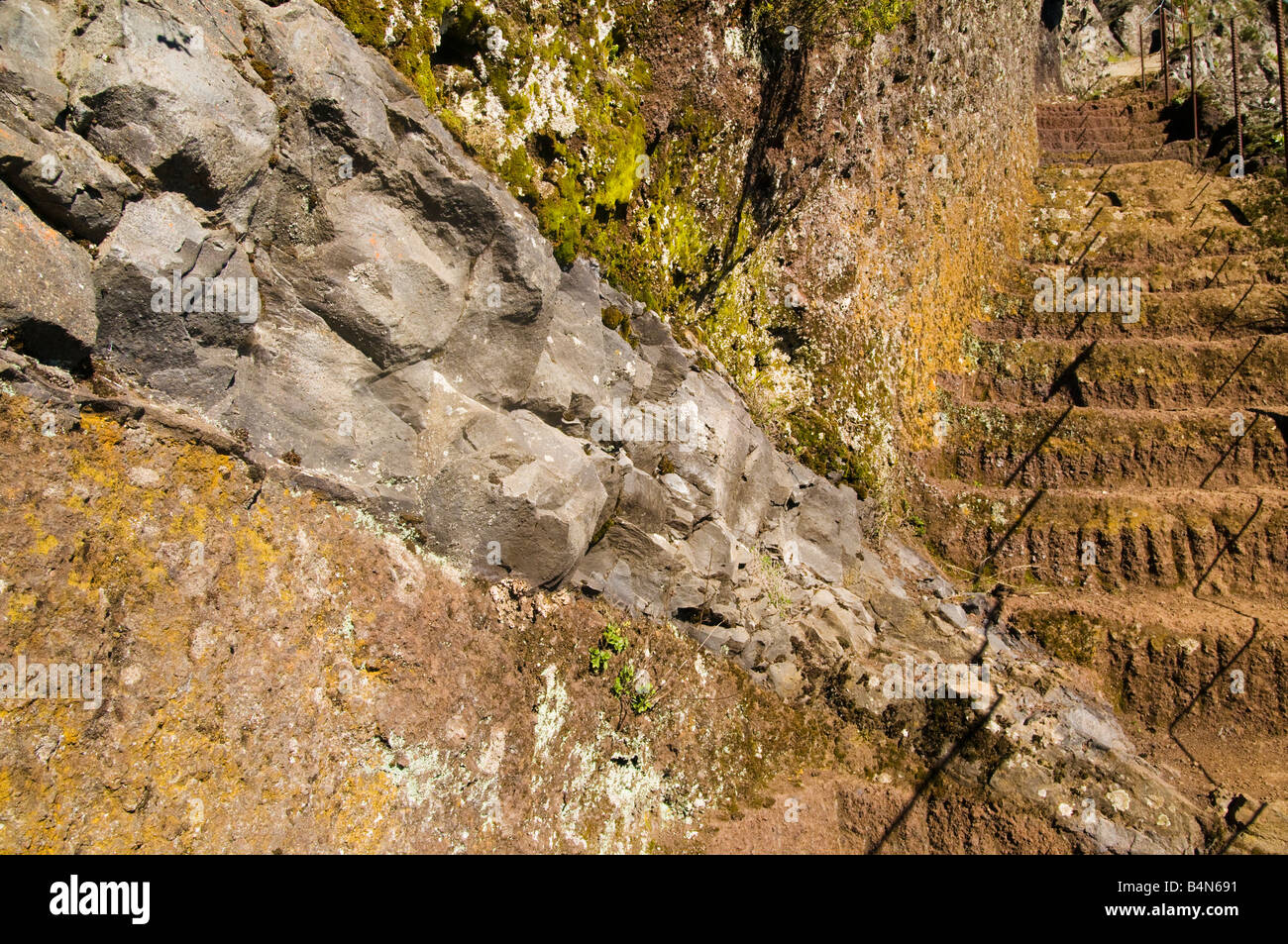Volcanic intrusion and carved rock steps on Pico das Torres Madeira ...