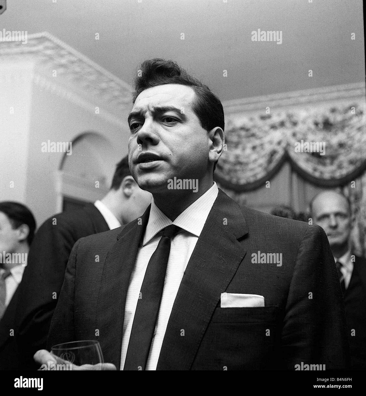 Mario Lanza Opera singer at a reception Nov 1957 holding wine glass ...