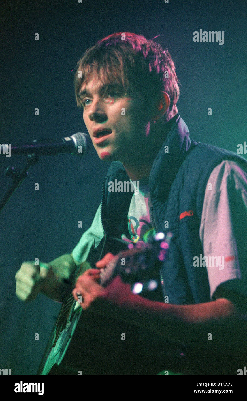 Blur 1997 Damon Albarn singer and playing guitar Stock Photo - Alamy