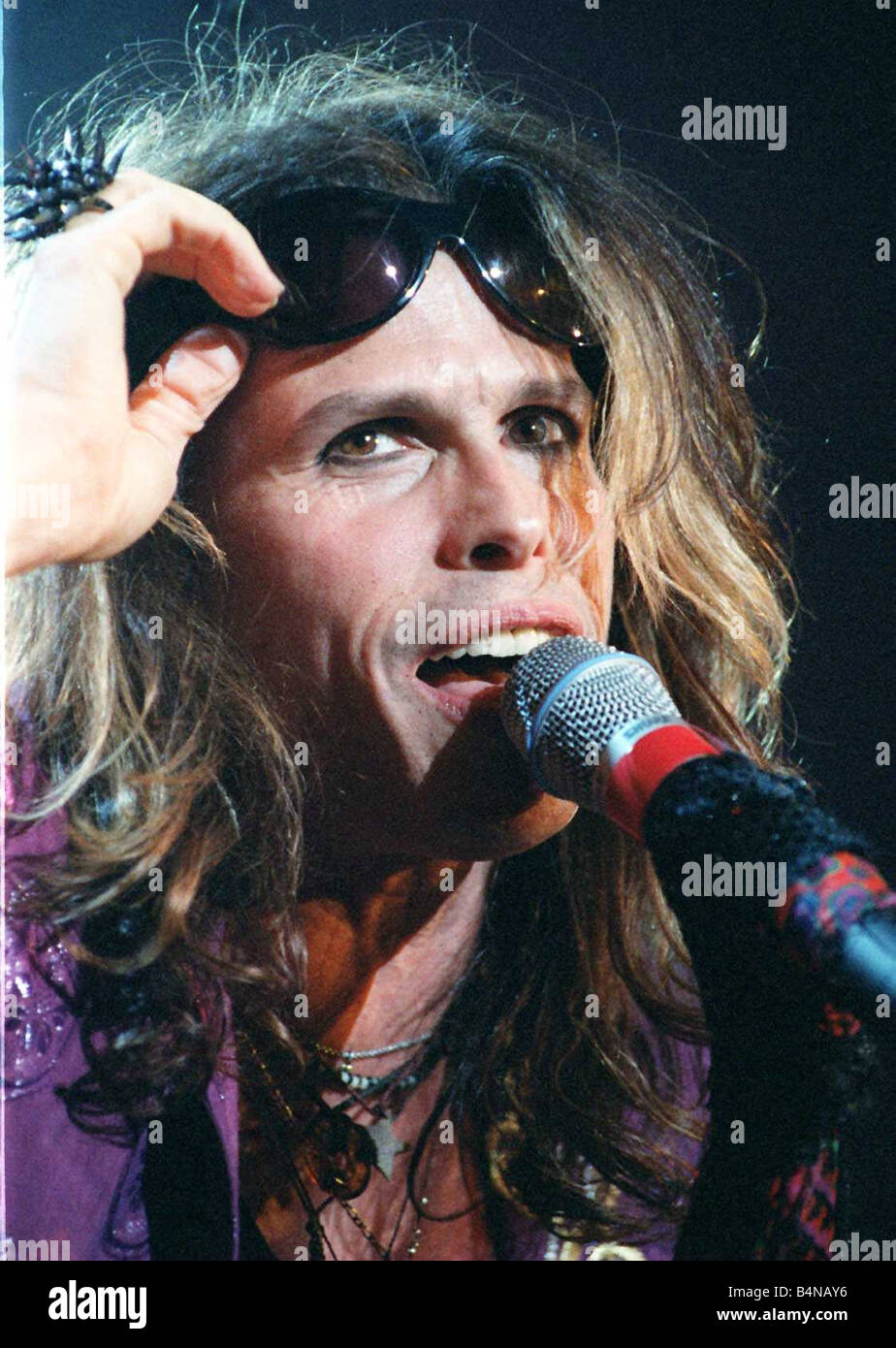 Steve Tyler Singer of pop group Aerosmith singing on stage at the SECC ...
