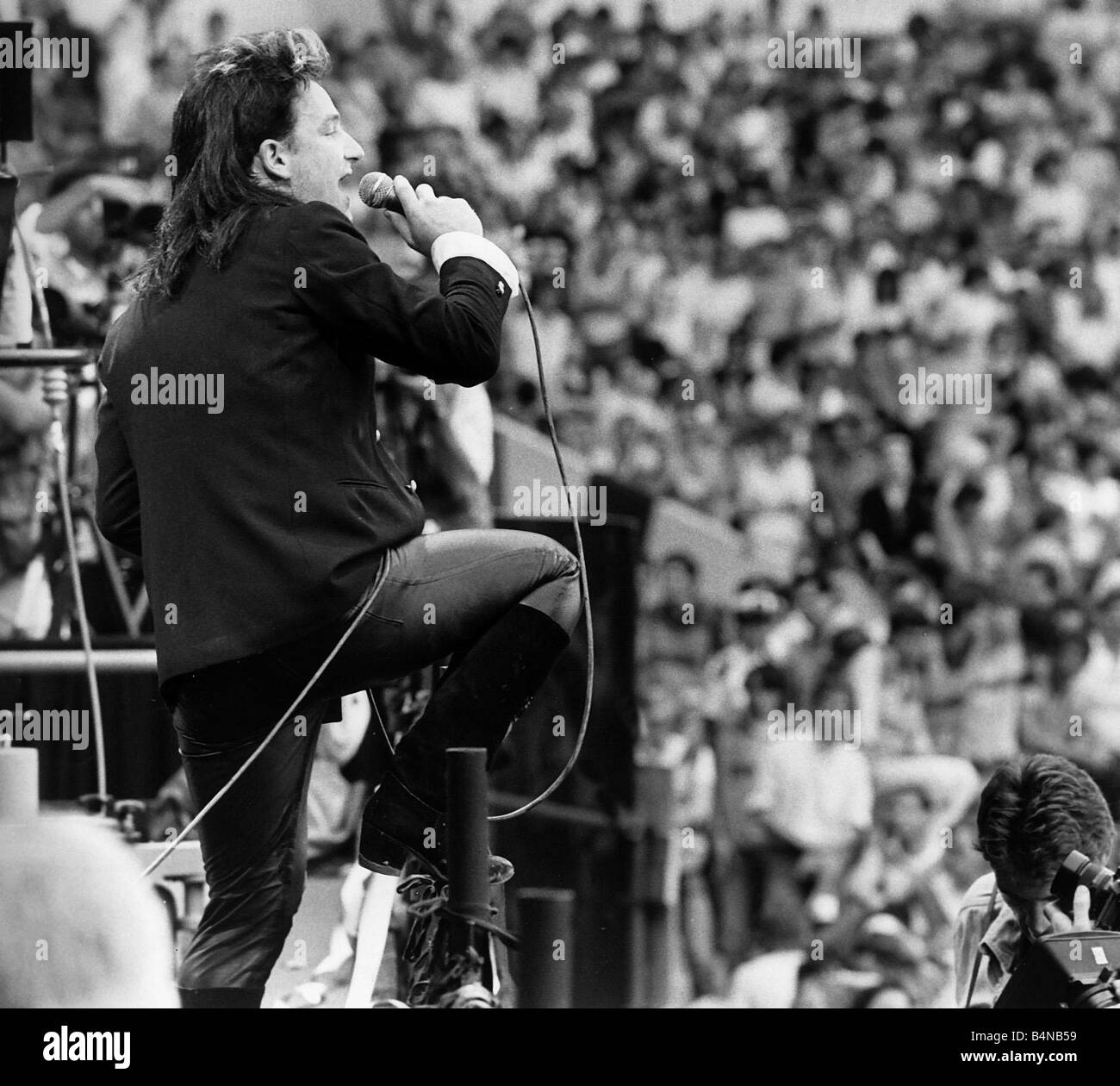 Bono pop singer with U2 on stage at Live Aid Concert 1985 Wembley ...