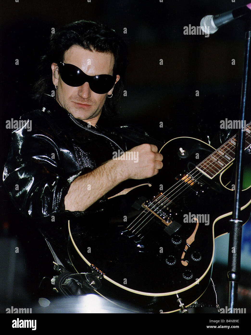 Bono of the pop group U2 on stage at Celtic Park in Glasgow 1992 Stock ...