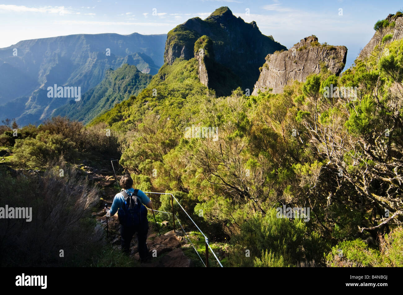 Walker descends from Pico da Encumeada Madeira with the plateau of Paul ...