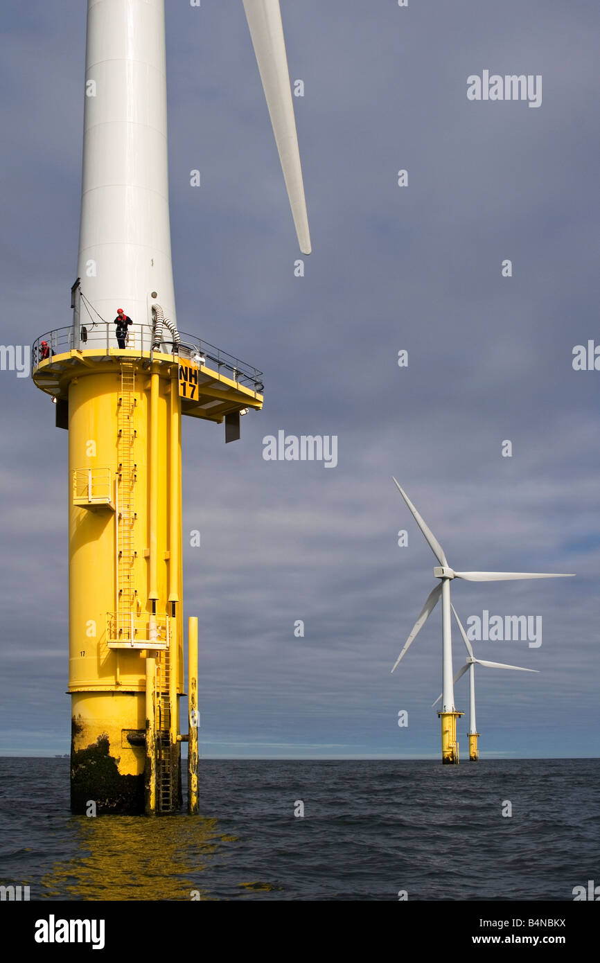 Maintenance engineers on tower of wind turbine of North Hoyle Offshore ...