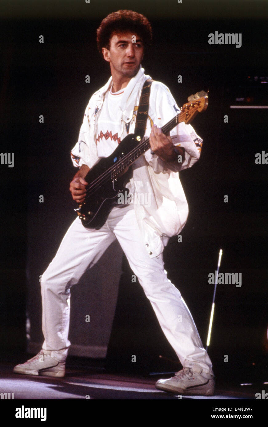Queen Rock Group John Deacon Playing Bass Guitar Queen In Concert At Queen Rock Group John Deacon Playing Bass Guitar Queen In Concert At