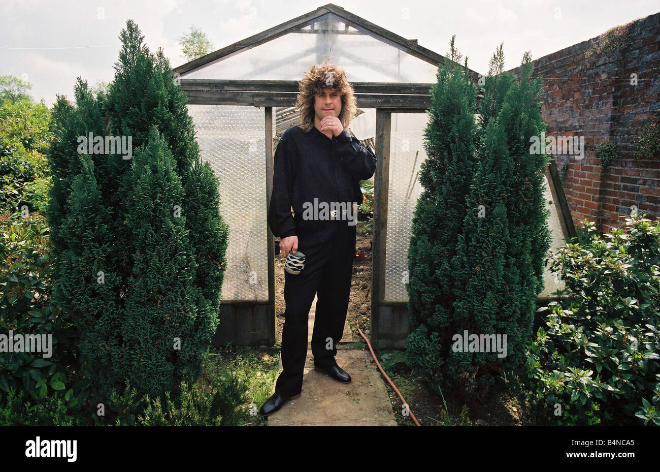 Black Sabbath singer Ozzy Osbourne in the garden of his home in 1988 ...
