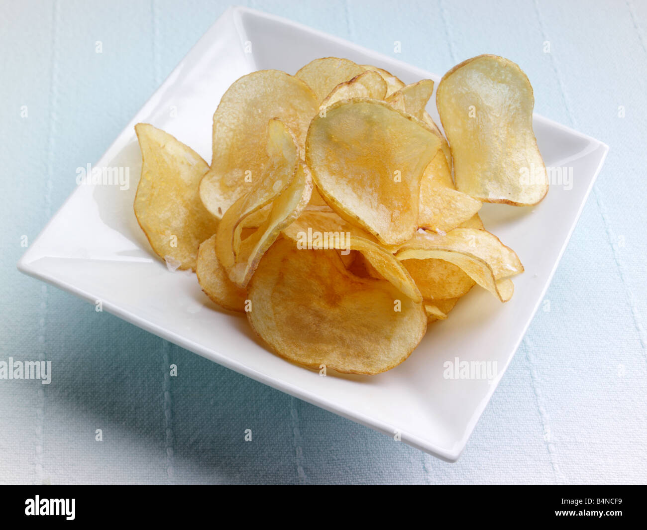 A bowl of game chips editorial food Stock Photo - Alamy