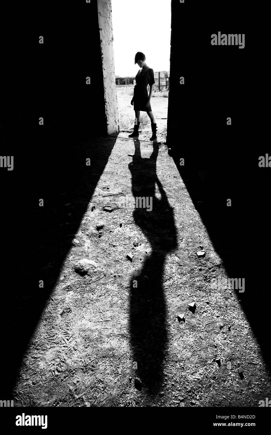 Silhouette man standing doorway Black and White Stock Photos & Images ...