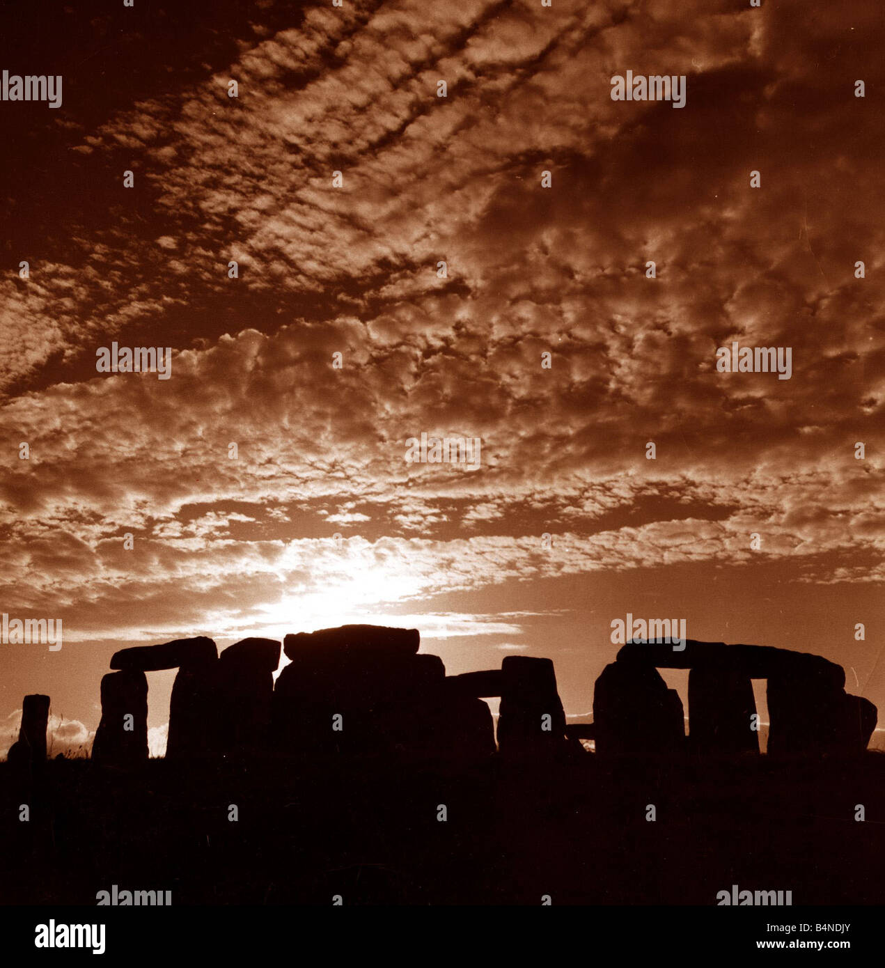 Sunset over Stonehenge in Wiltshire Britain Sunset Silhouette Clouds ...