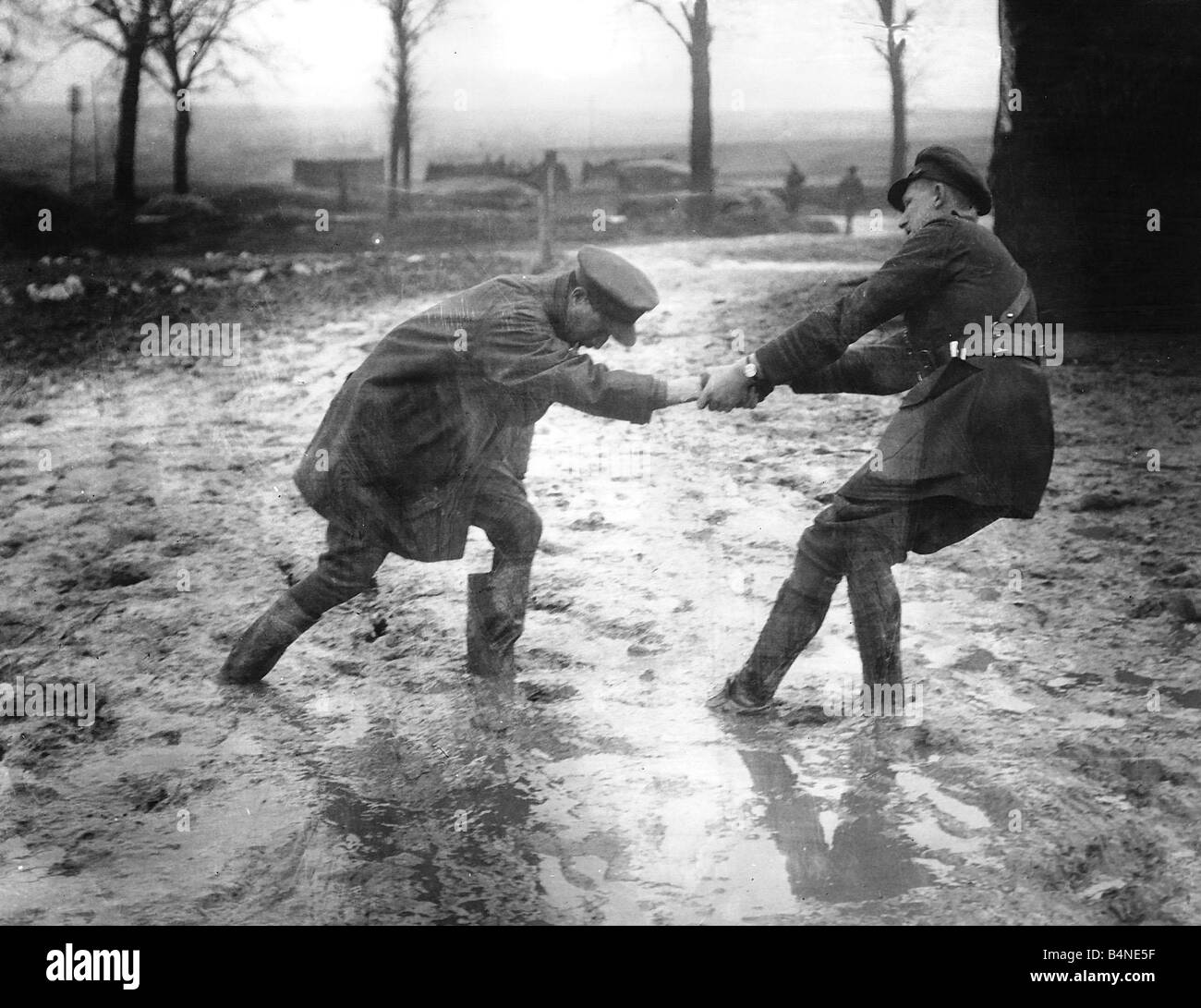World War One A British officer helps a fellow officer who s feet are ...