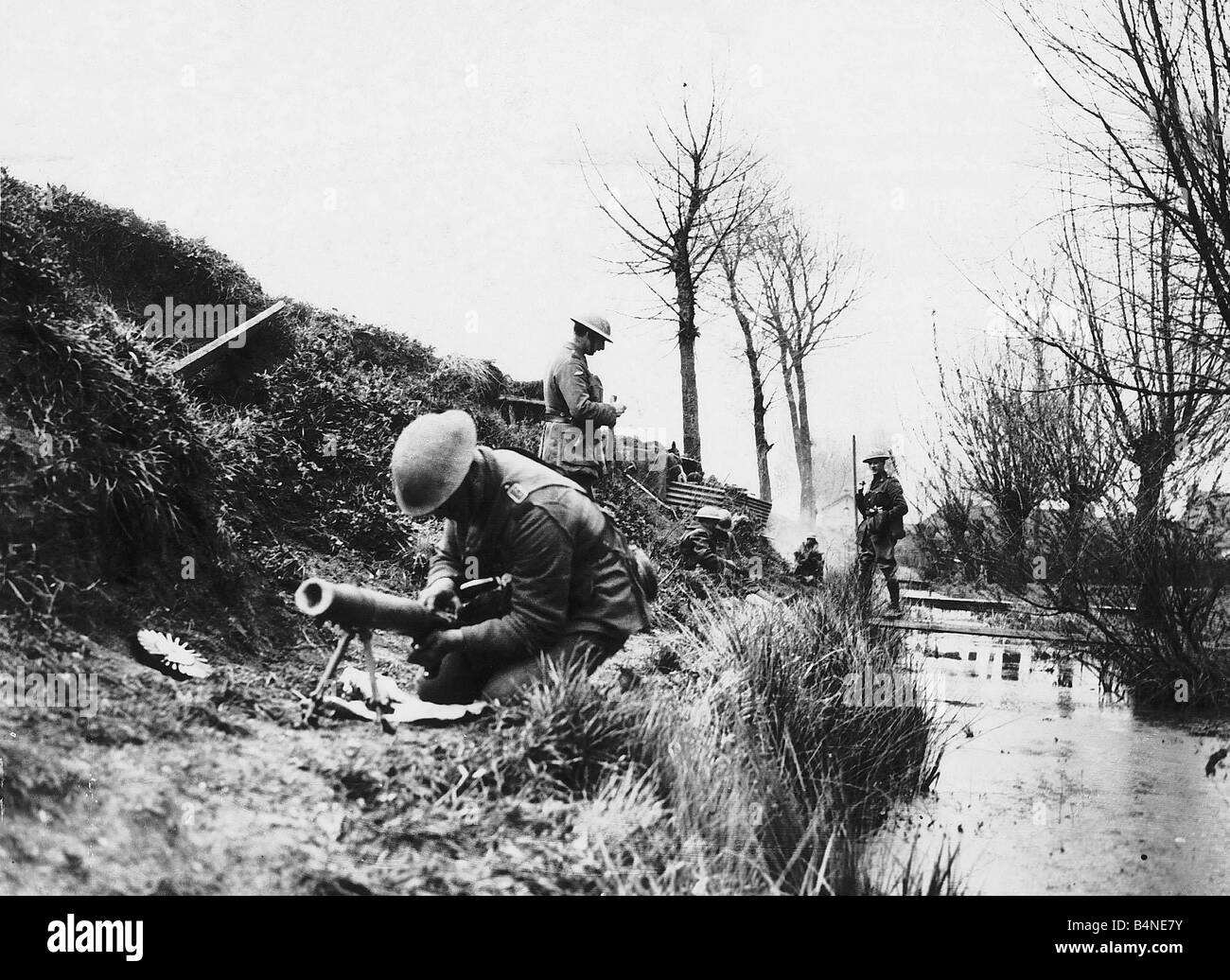 Soldier in a trench with his machine gun hi-res stock photography and ...