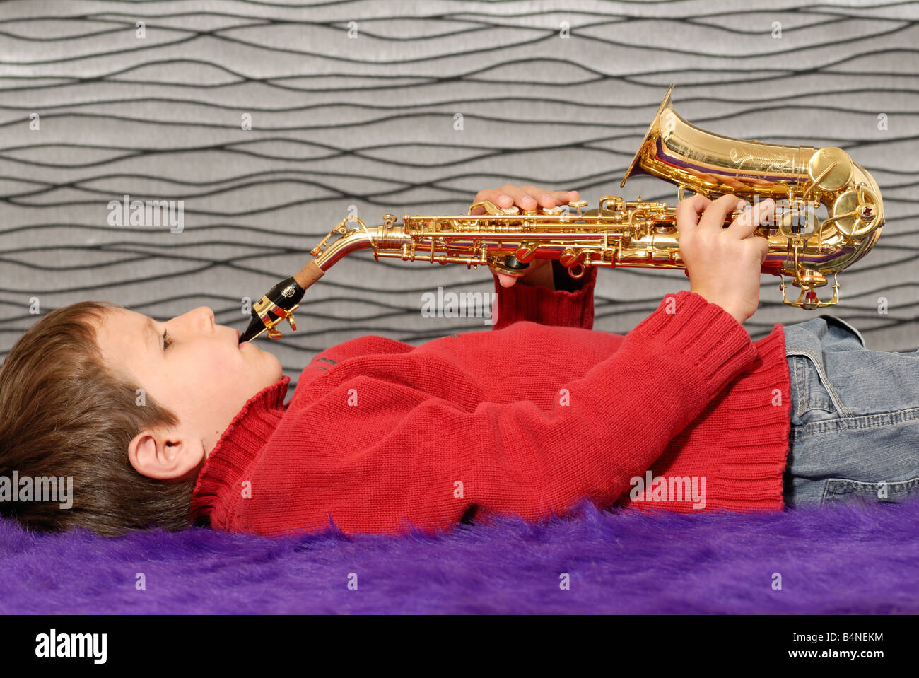 child playing saxophone Stock Photo - Alamy