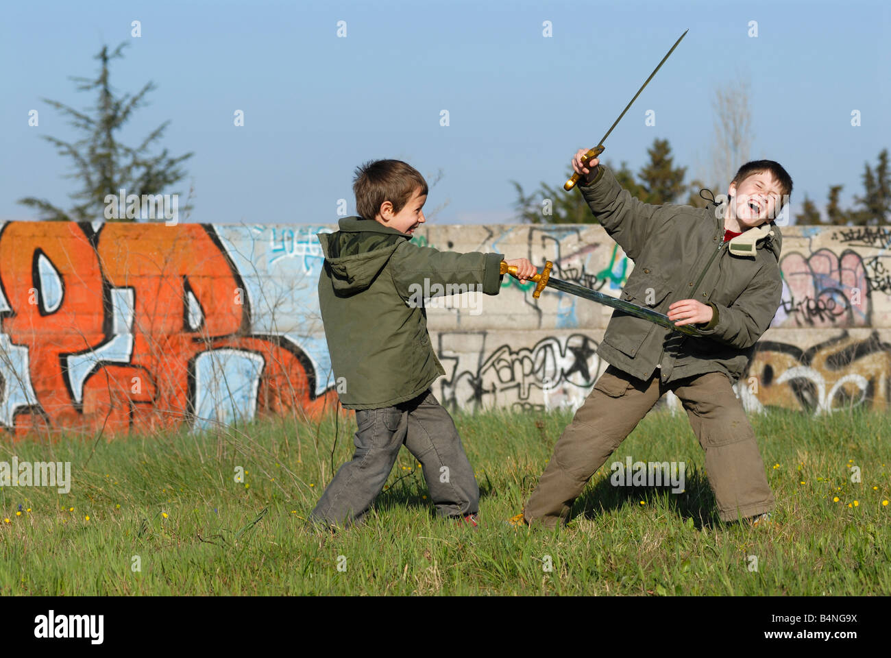 children playing with swords Stock Photo - Alamy