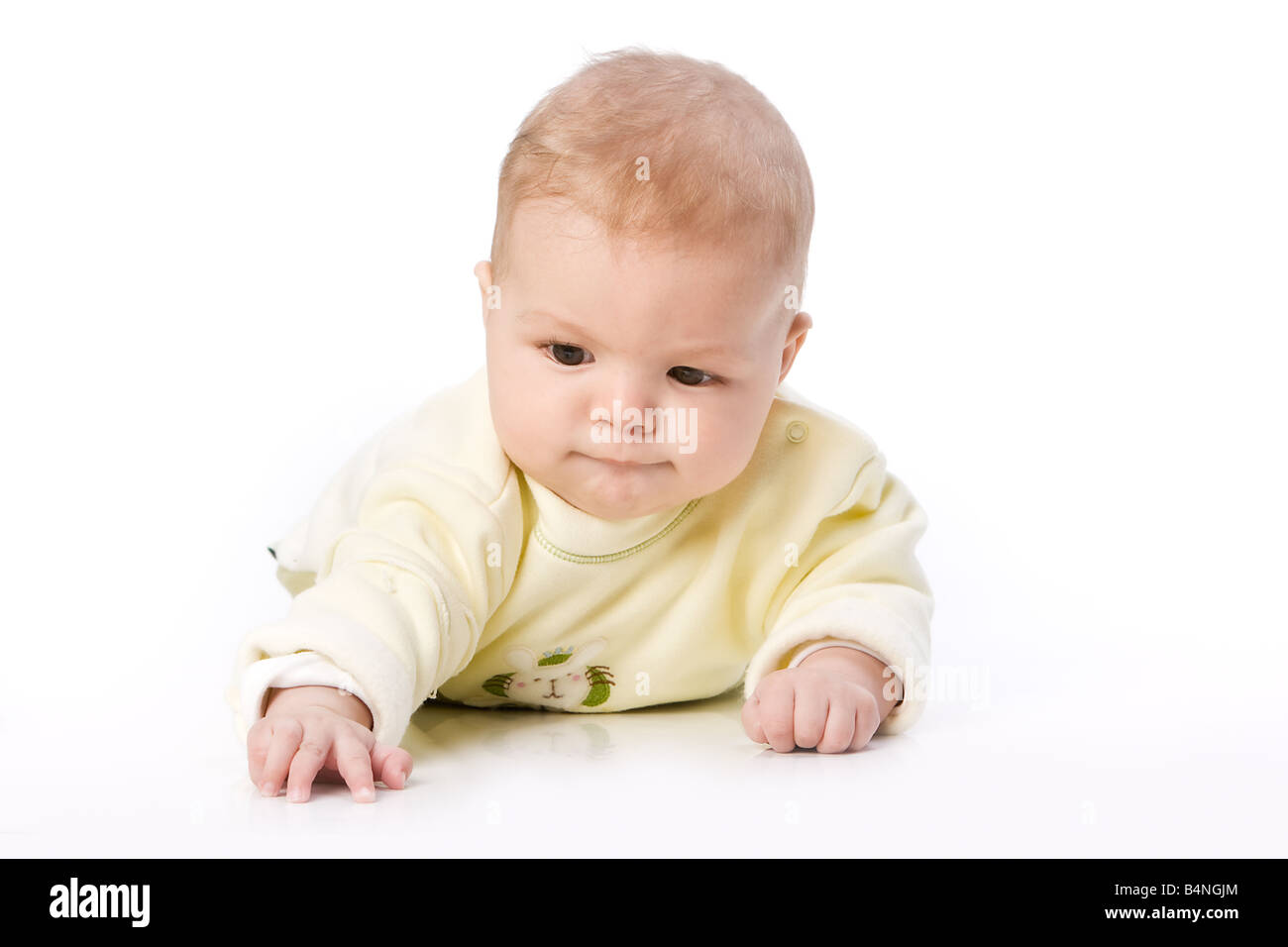 Laying baby curious facial expression Stock Photo - Alamy