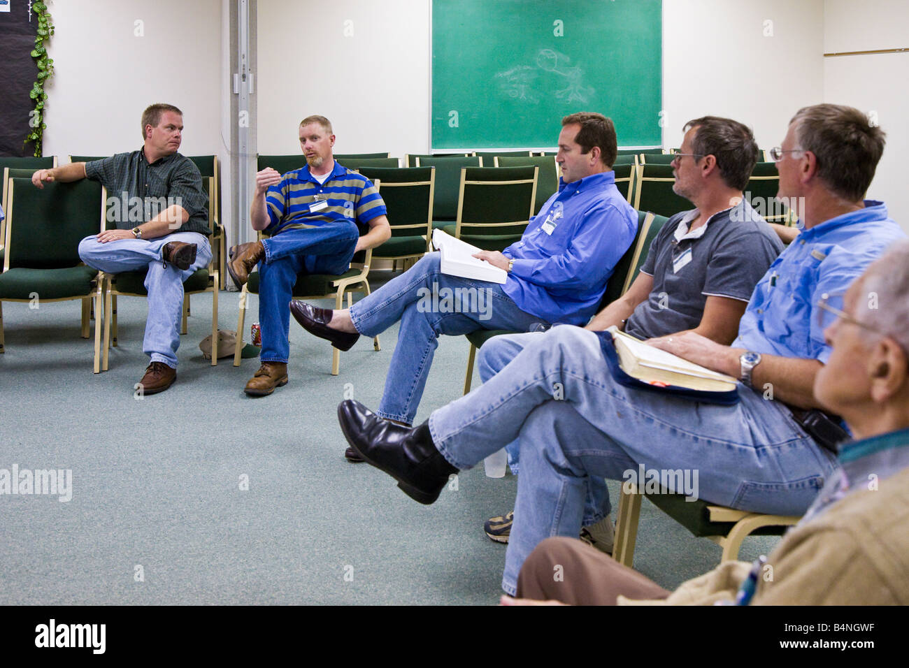 Men meeting group for worship at Baptist Church Stock Photo - Alamy