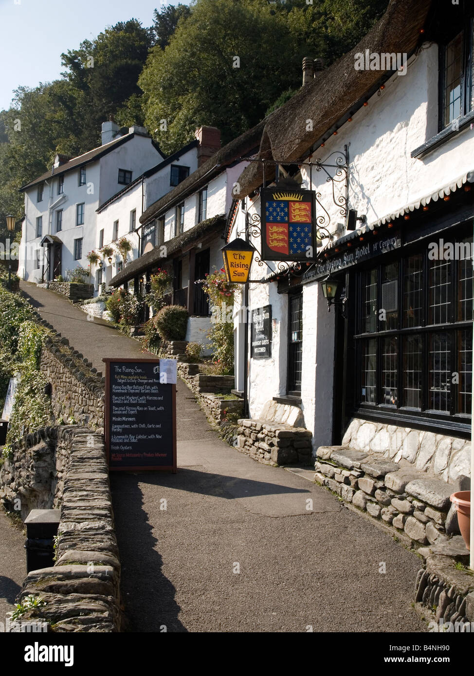 Traditional and picturesque Rising Sun Inn over looking the harbour at ...