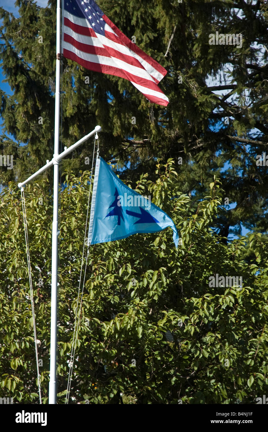 American flag and yacht club flag on nautical type pole Stock Photo - Alamy