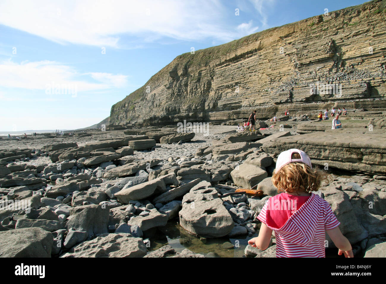 Playing in rock pool hi-res stock photography and images - Alamy