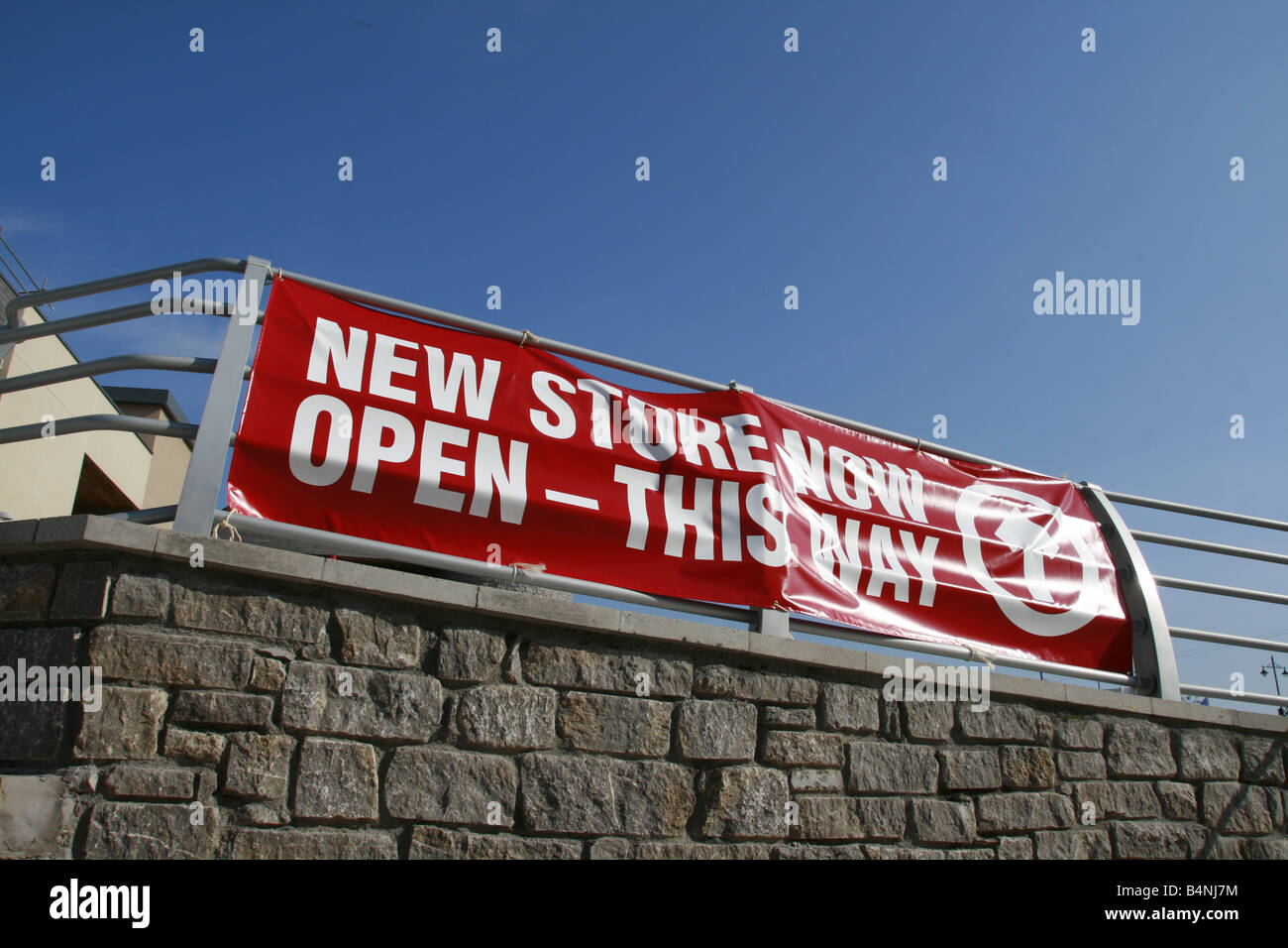 new store open sign notice banner outdoors, wales Stock Photo - Alamy