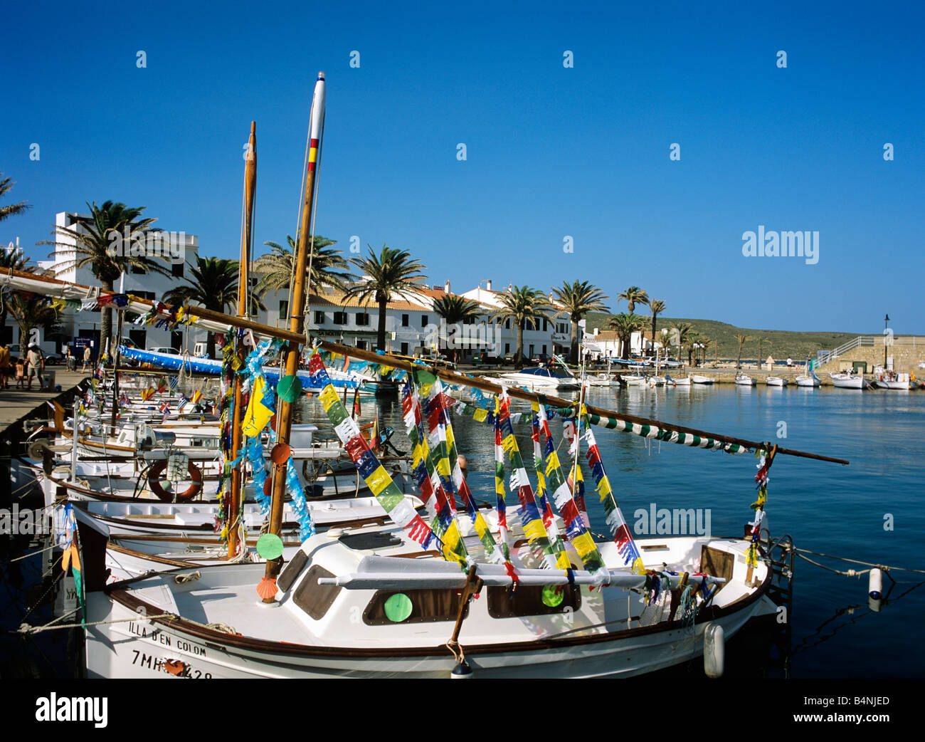 Fishing boats at fornells village hi-res stock photography and images ...