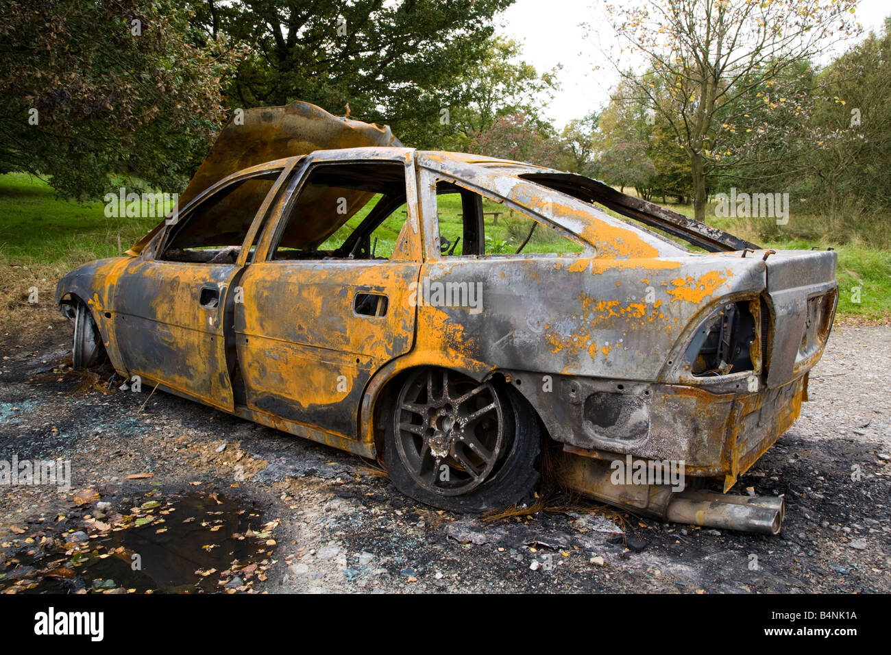Abandoned burnt out car Stock Photo - Alamy