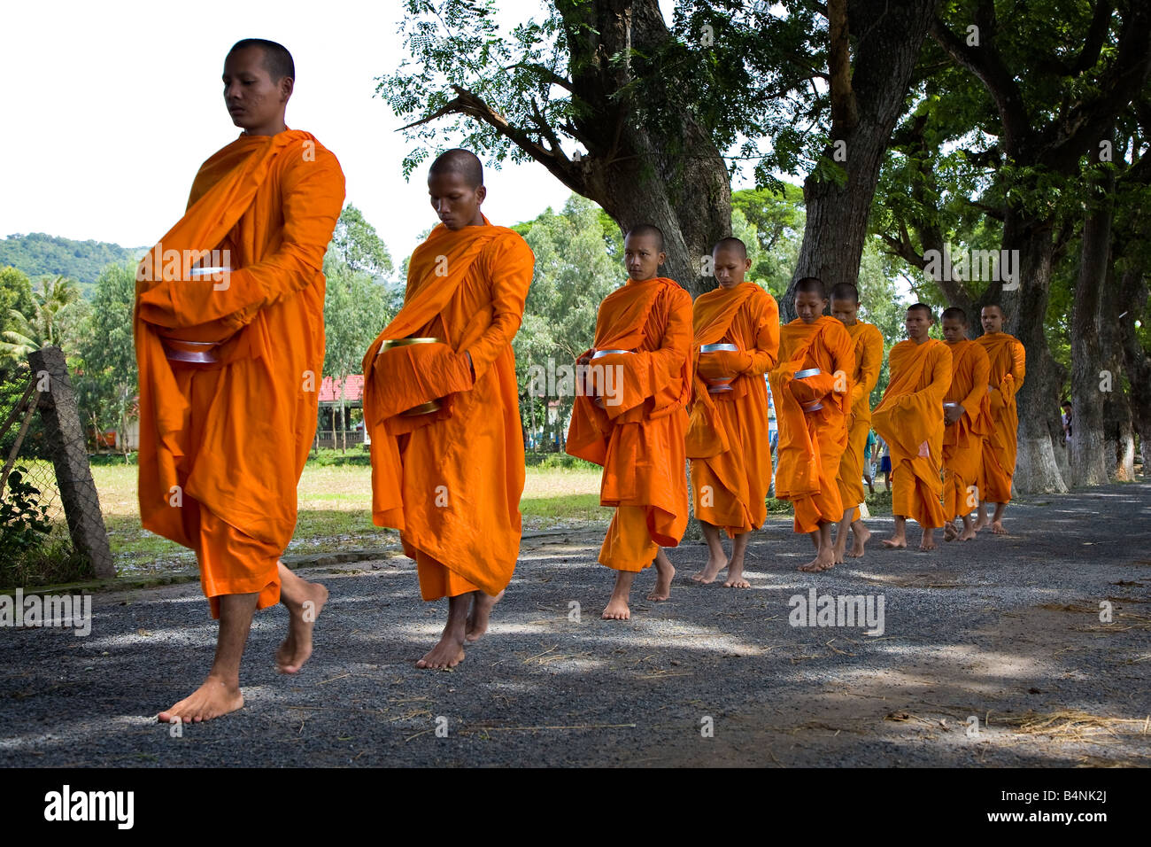 Monks at temple procedding with their morning procession Stock Photo ...