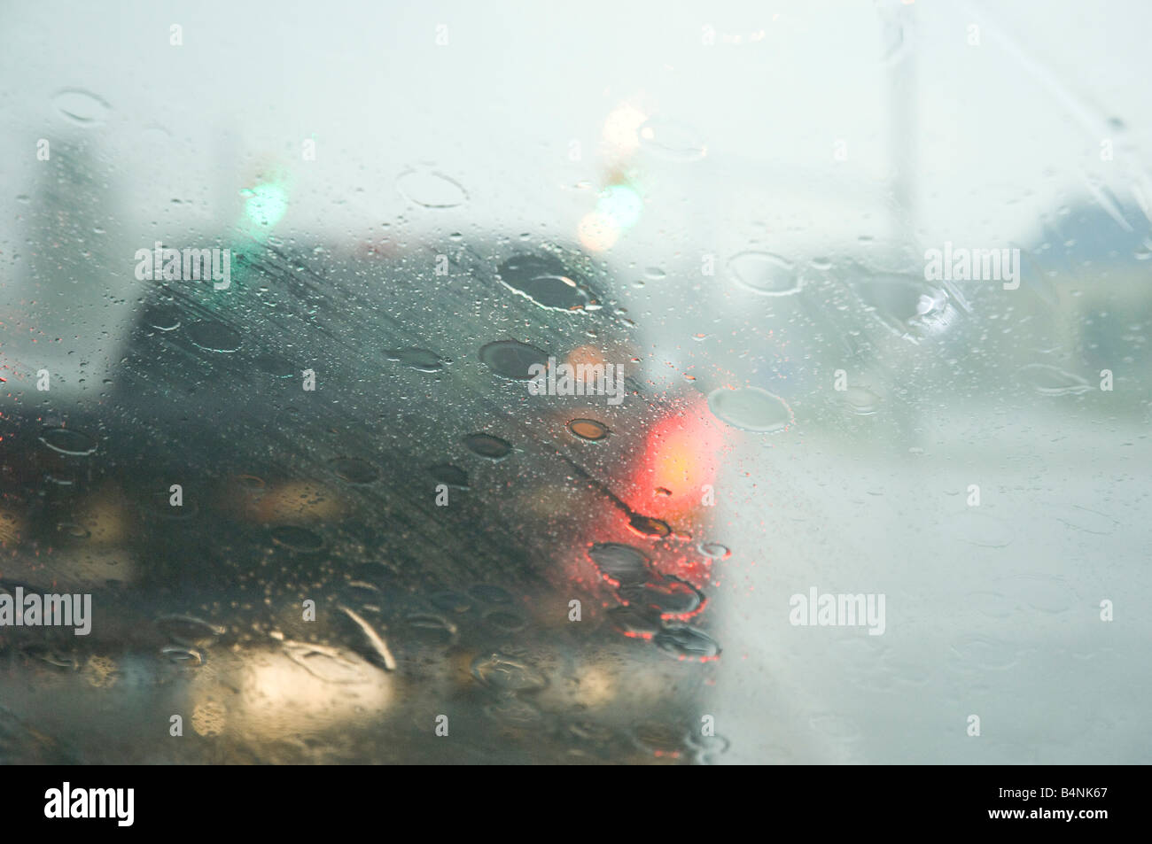 black pickup truck viewed through a rain soaked windshield Stock Photo ...