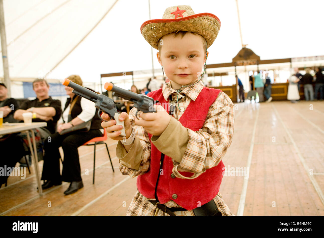 Creetown Country Music Festival young boy dressed as sheriff with guns ...