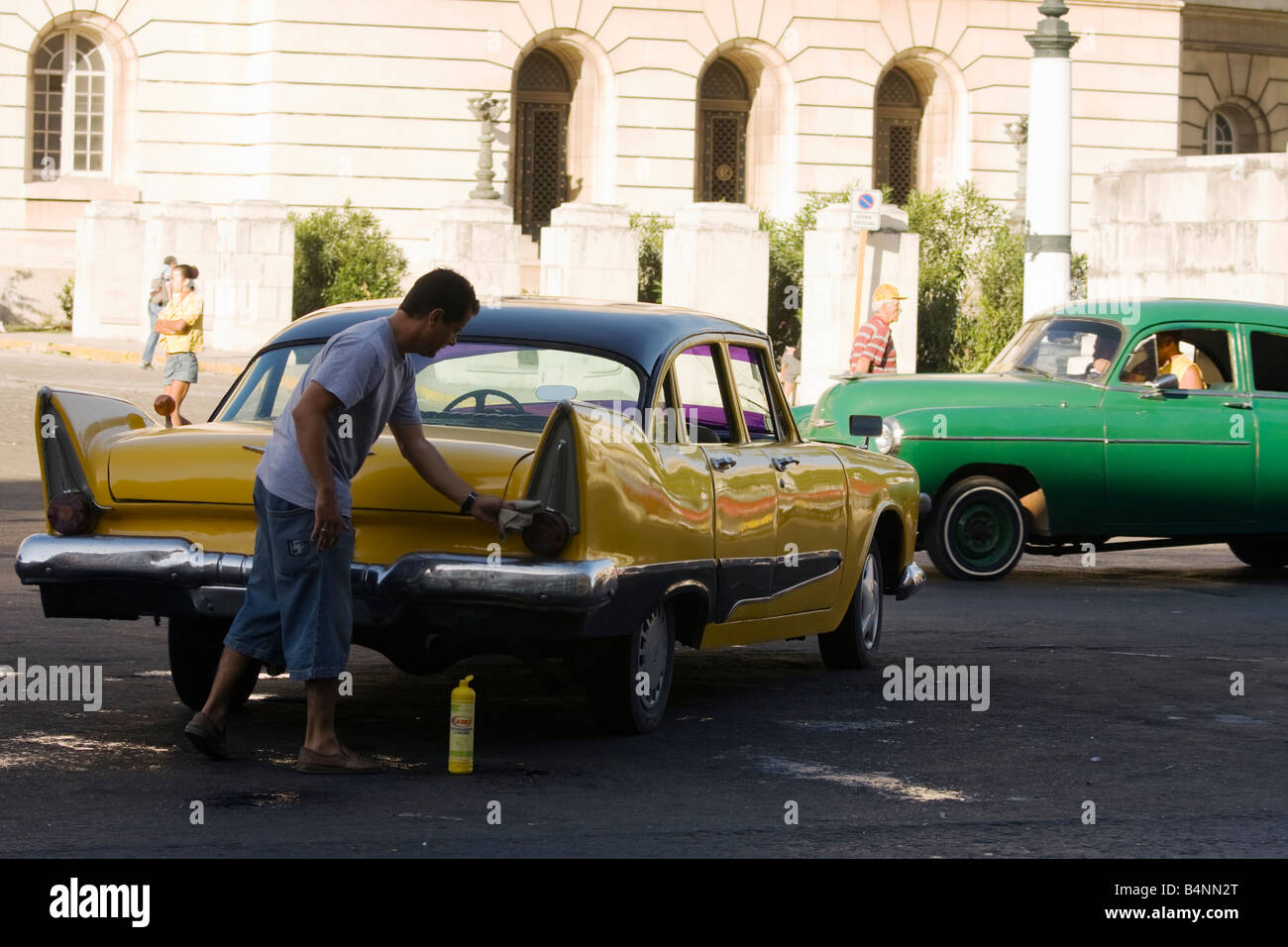 Man washing his vintage Chevrolet Stock Photo - Alamy