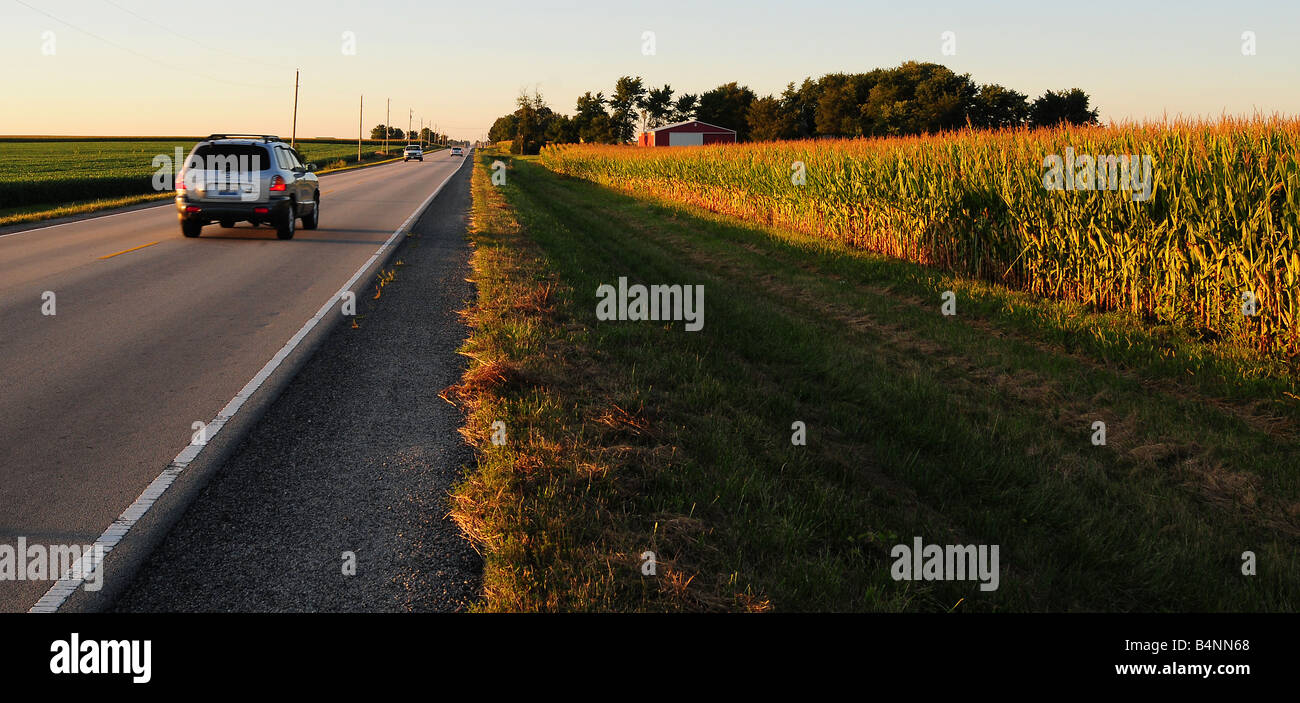 Highway country road in Illinois in farm country. Corn and soybean ...