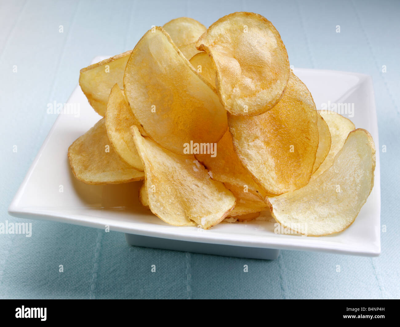 A bowl of game chips editorial food Stock Photo - Alamy