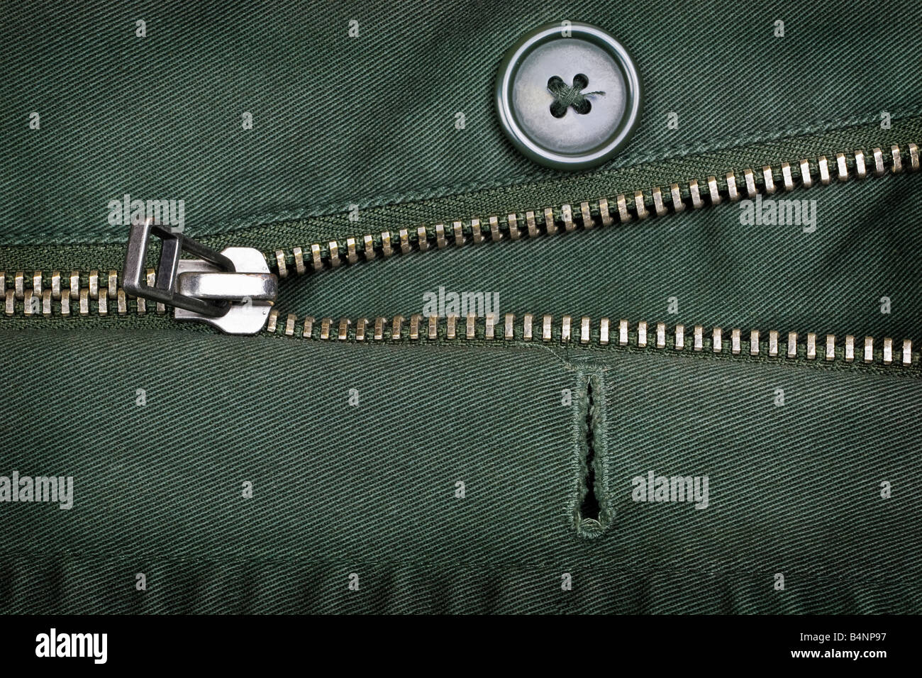 Zipper on a green fabric Horizontal shot Stock Photo - Alamy