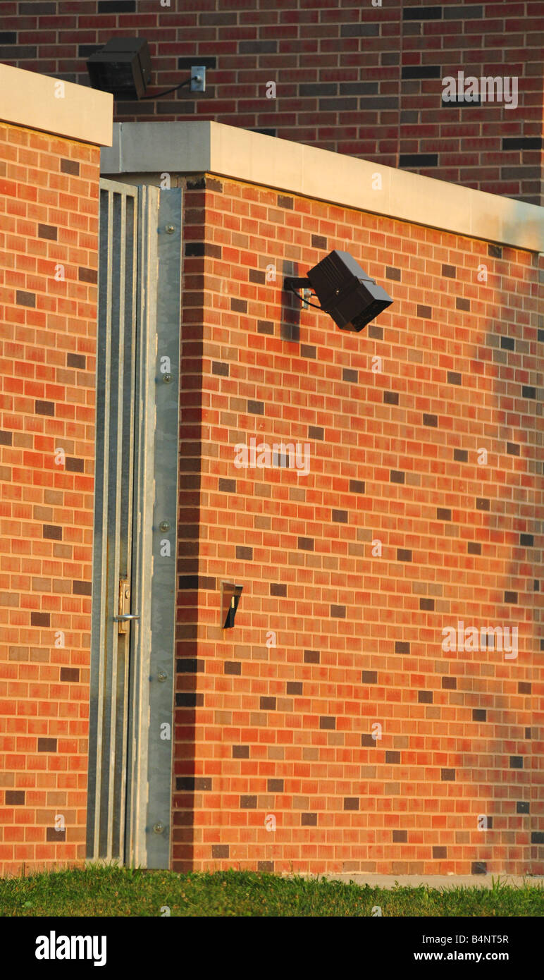 Security camera on a brick building Stock Photo - Alamy