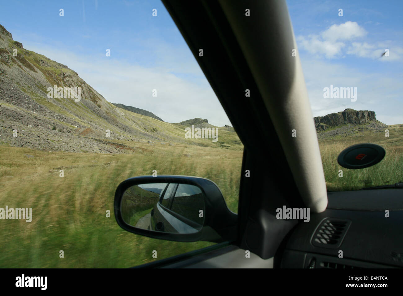 car driving on rural country road in wales uk Stock Photo - Alamy