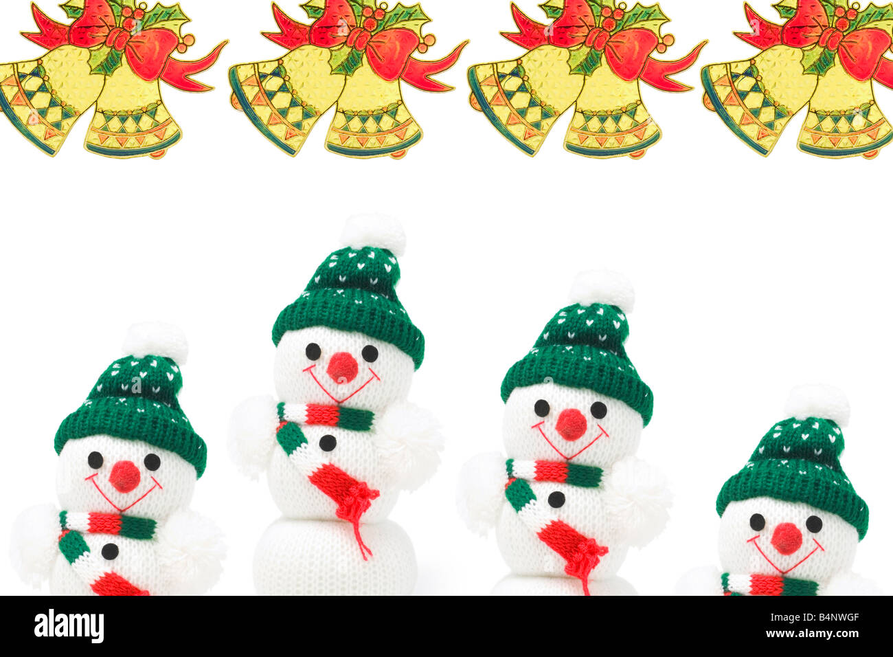 Snowman Figurines and Christmas Bells Stock Photo - Alamy