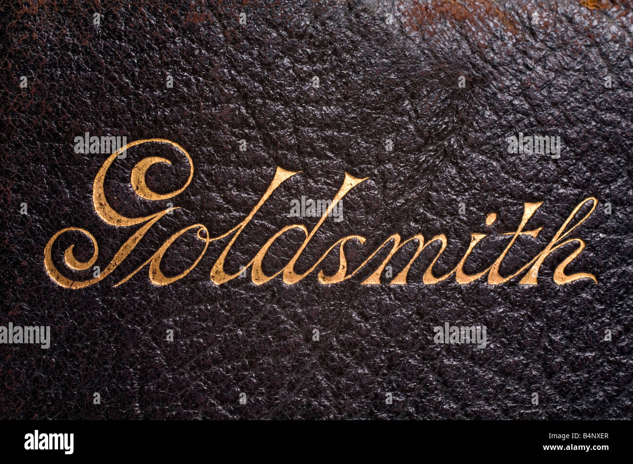 The name of the author Goldsmith engraved in gold on the leather ...