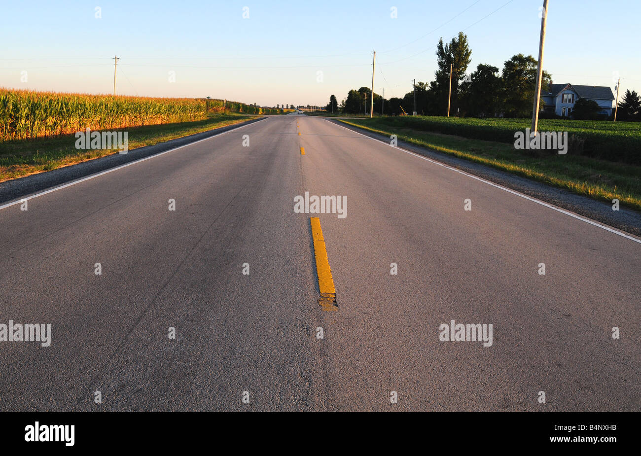 Highway country road in Illinois in farm country. Corn and soybean ...
