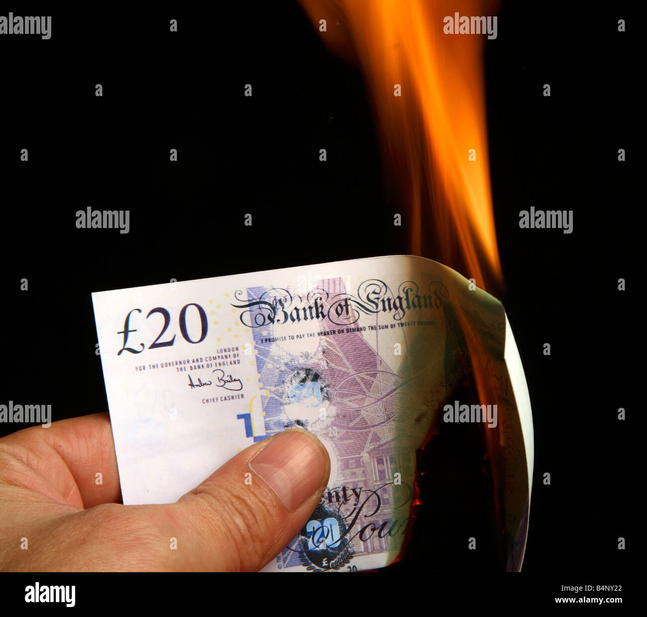 Burning £20 bank note Stock Photo - Alamy