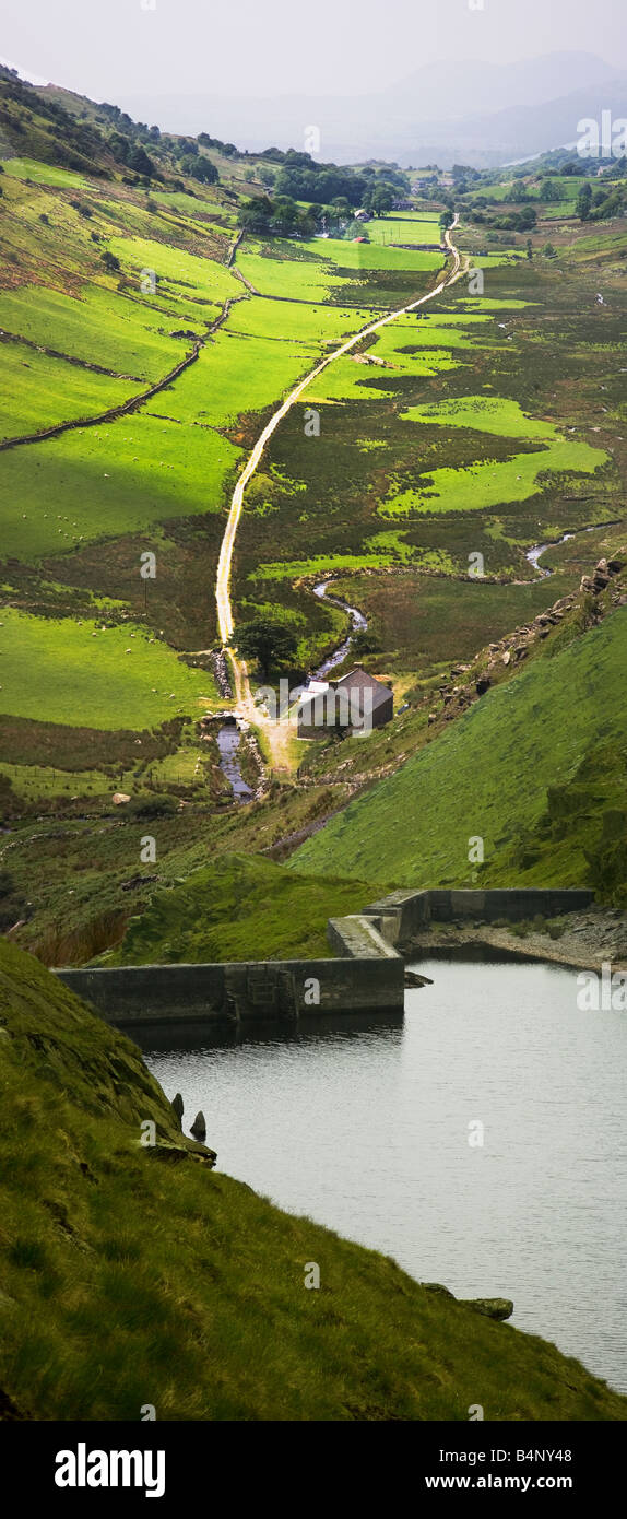 Looking SW over dam from reservoir down Cwm Croesor valley with turbine ...