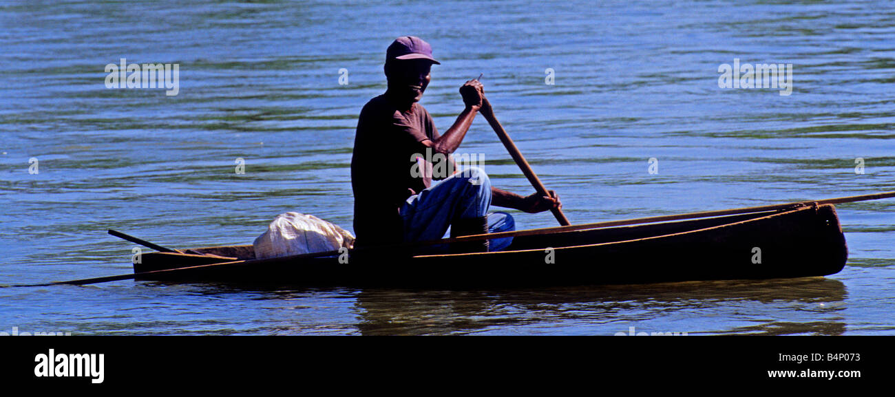 Belize fisherman on Belize river Stock Photo - Alamy