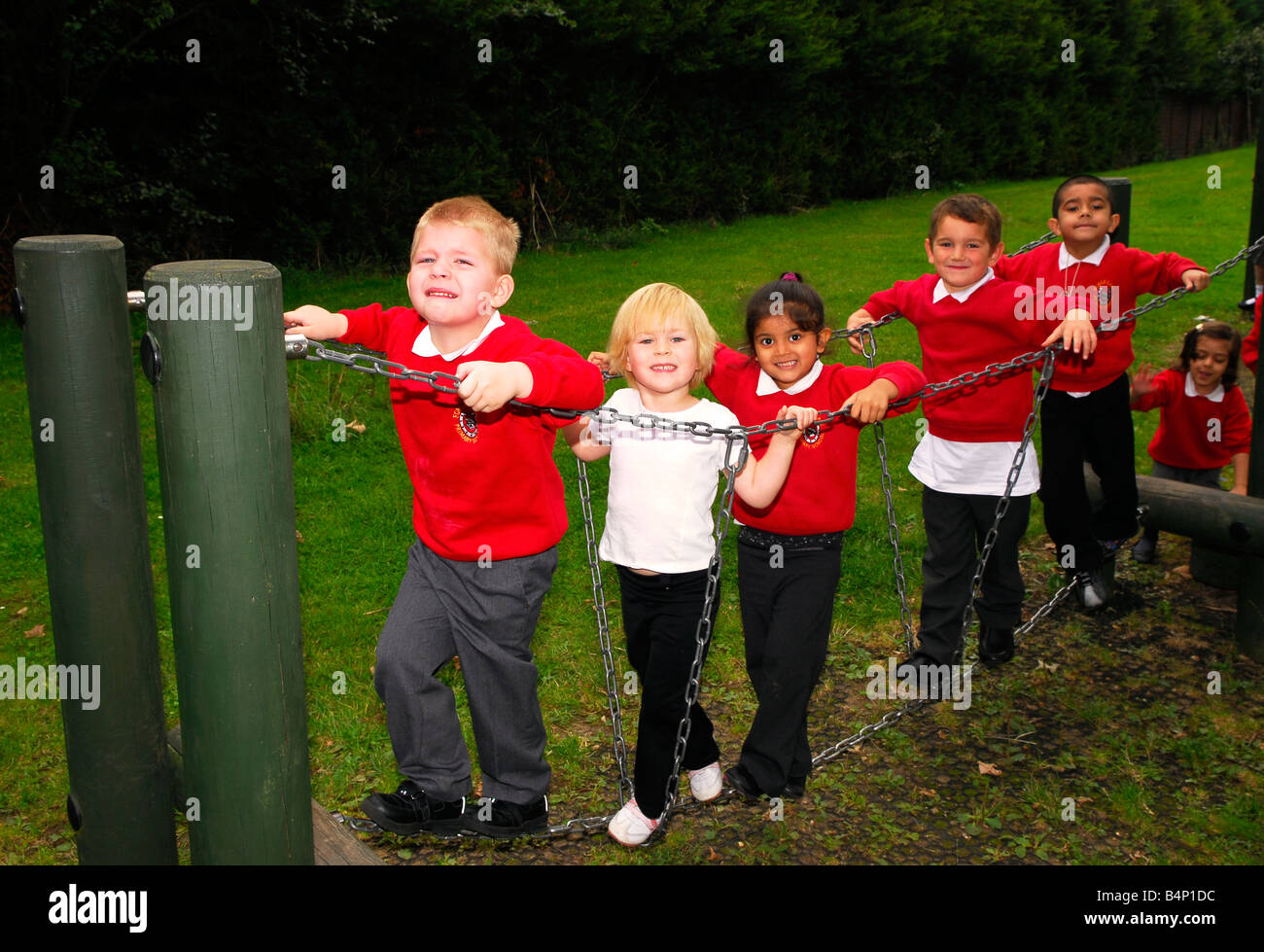 Primary school pupils in playground, Hanworth, Middlesex, UK Stock ...