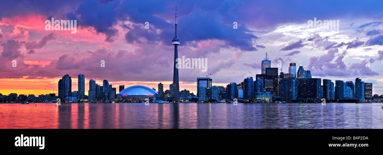 Scenic view at Toronto city waterfront skyline at sunset Stock Photo ...