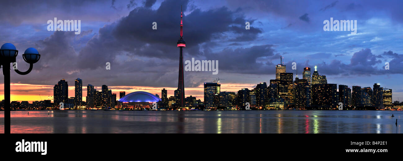 Scenic view at Toronto city waterfront skyline at sunset Stock Photo ...