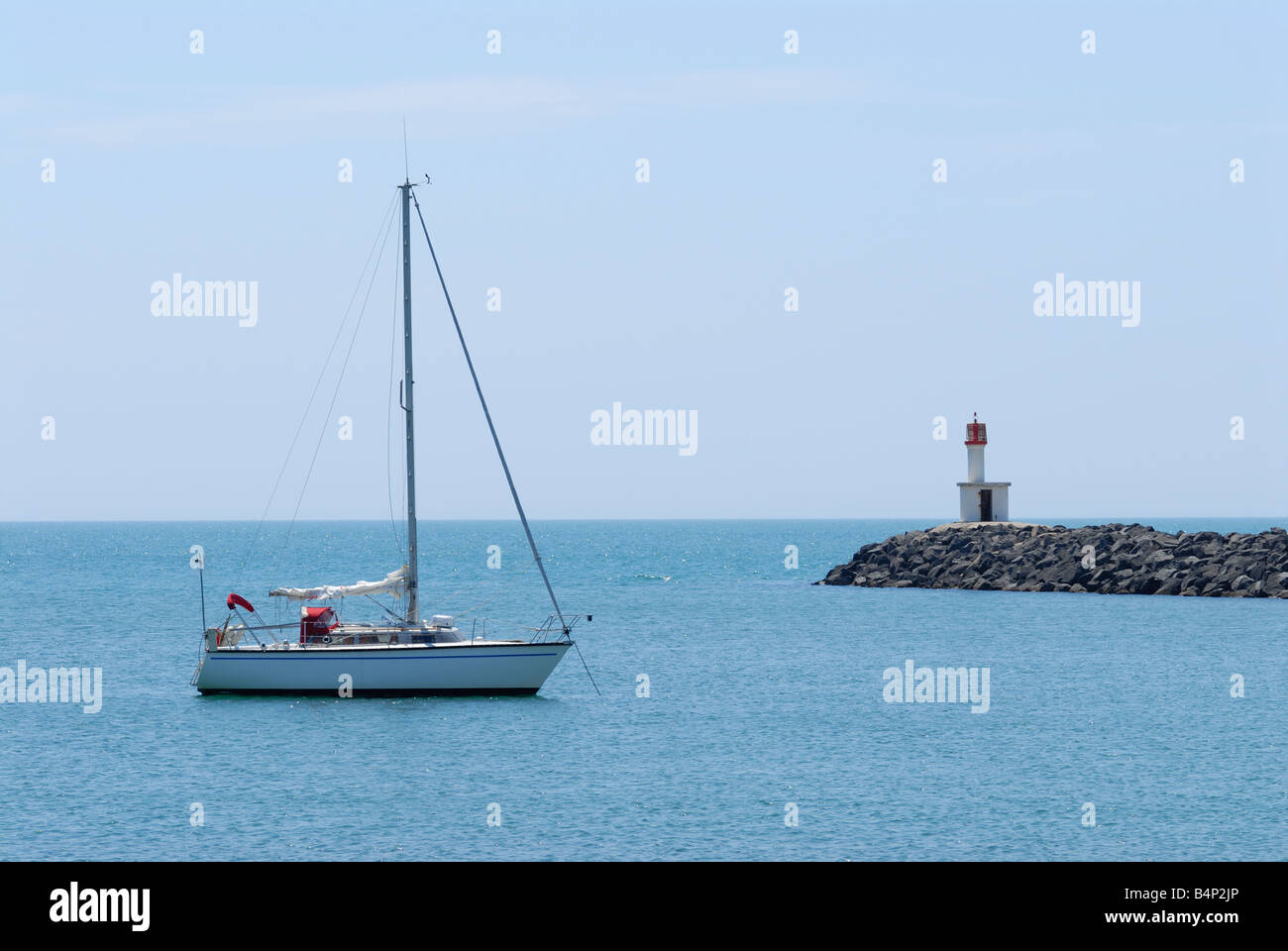Sailing boat lighthouse hi-res stock photography and images - Alamy
