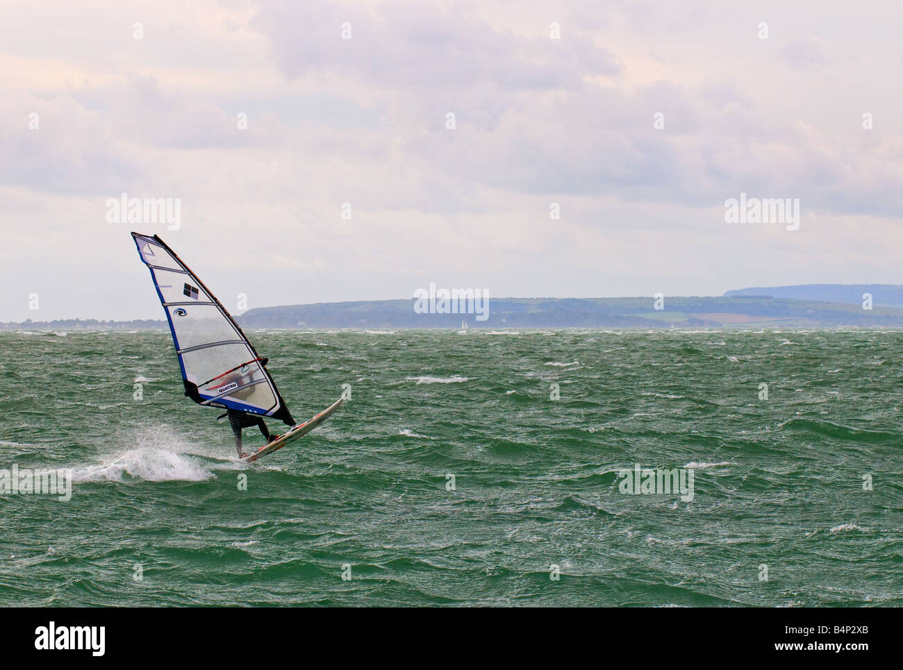 A windsurfer in the Solent Stock Photo - Alamy