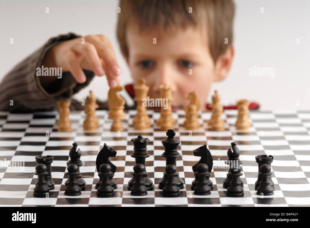 child playing chess Stock Photo - Alamy